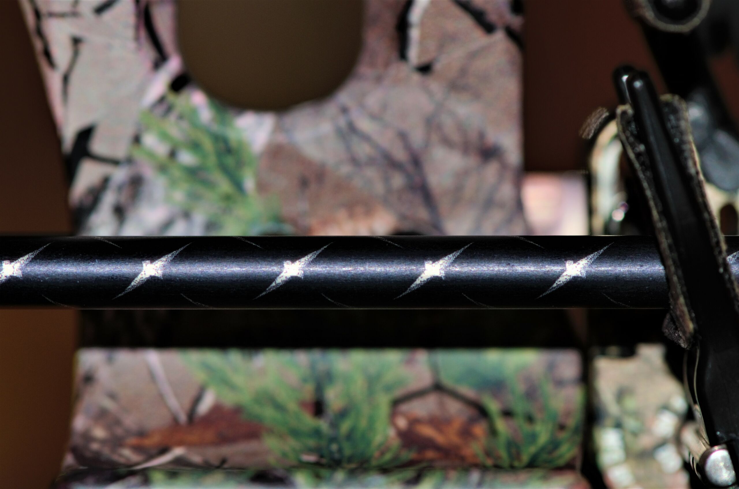 File:Place arrow center shot and align to the two holes in the frame of ...